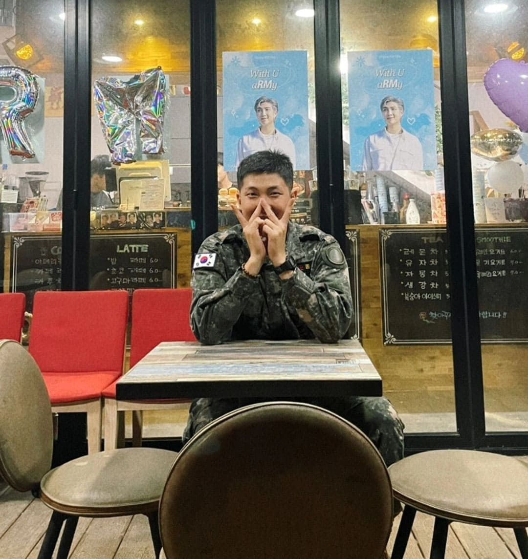 BTS RM Surprises with a Visit to His Birthday Cafe in Military Uniform
